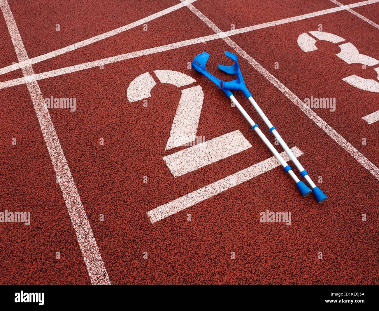 Medicine crutch for broken leg. Number two. Big white track number two ...