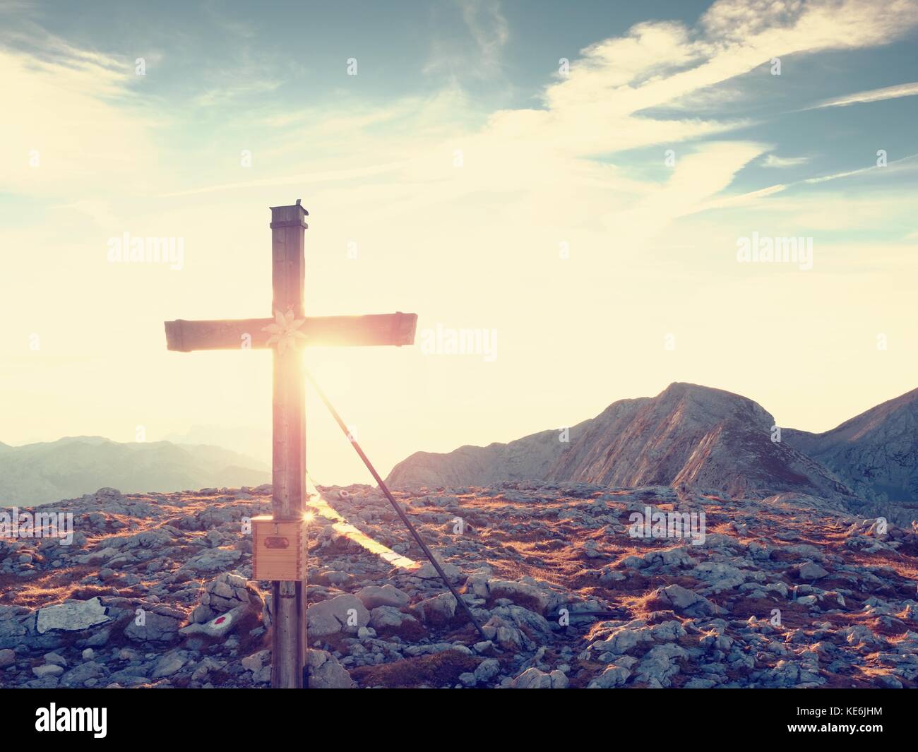 Traditional cross at mountain top in Alp. Cross on top of a mountains ...