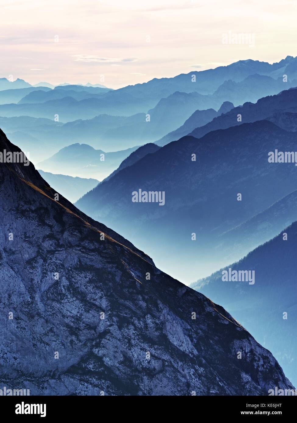 View over high sharp mountain peaks from plane, beautiful view ...