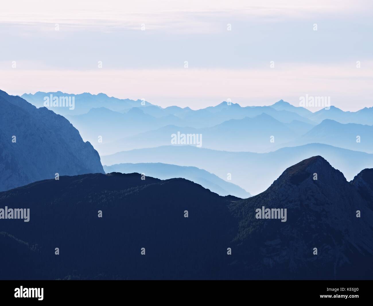 View over high sharp mountain peaks from plane, beautiful view ...