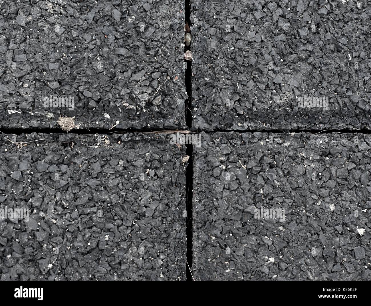 Flexible tile for playground. Tiles made from a mixture of rubber crumb ...
