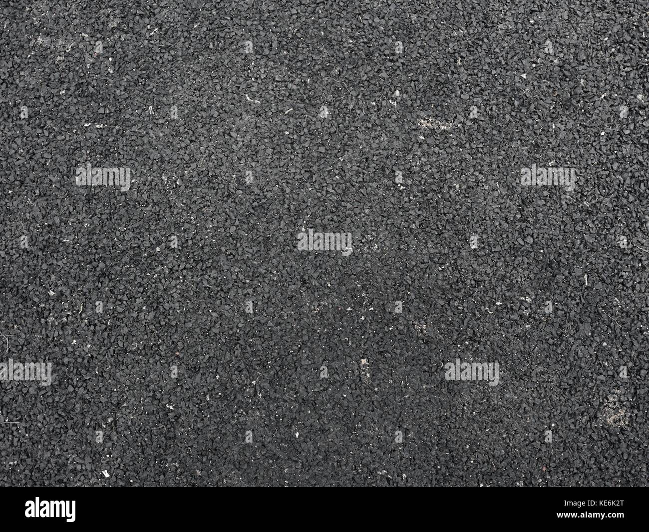 Flexible tile for playground. Tiles made from a mixture of rubber crumb ...