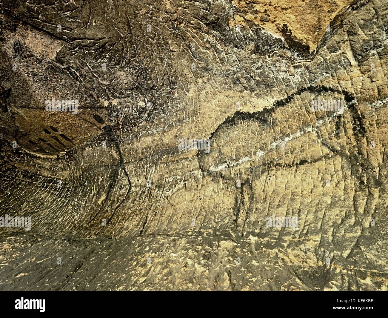 Buffalo hunting. Paint of human hunting on sandstone wall, prehistoric ...