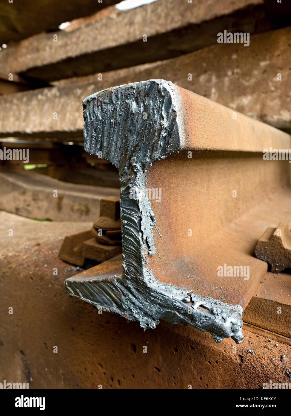 Detail of cut rail. Autogen torch cut rail rod on concrete sleeper ...
