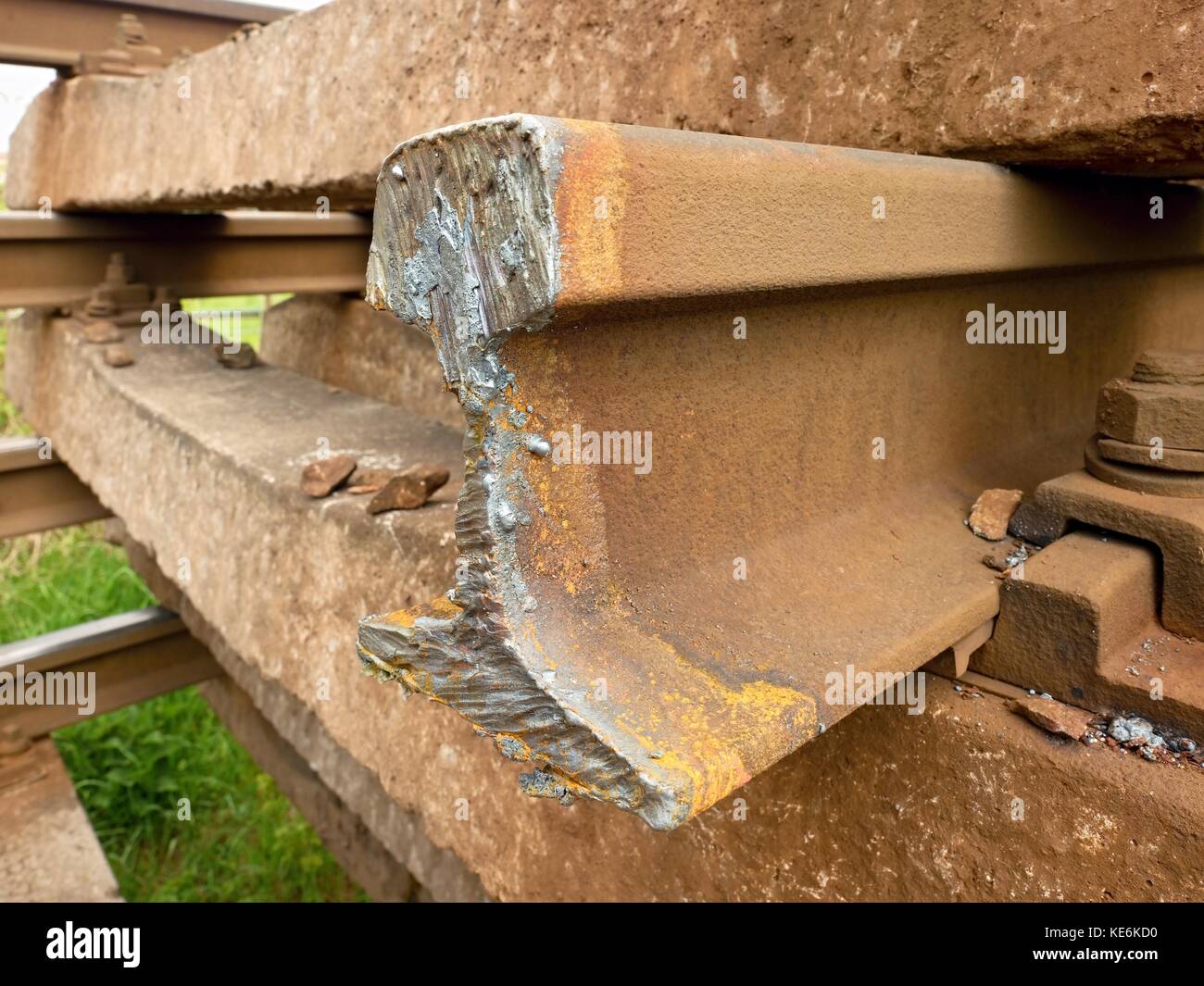 Detail of cut rail. Autogen torch cut rail rod on concrete sleeper ...
