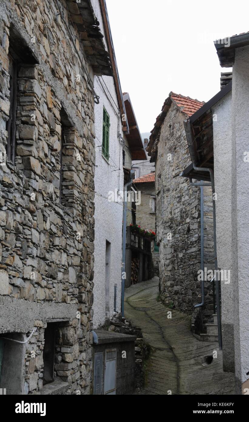 A winding narrow road, in the village of Carrega Ligure, Piedmont ...