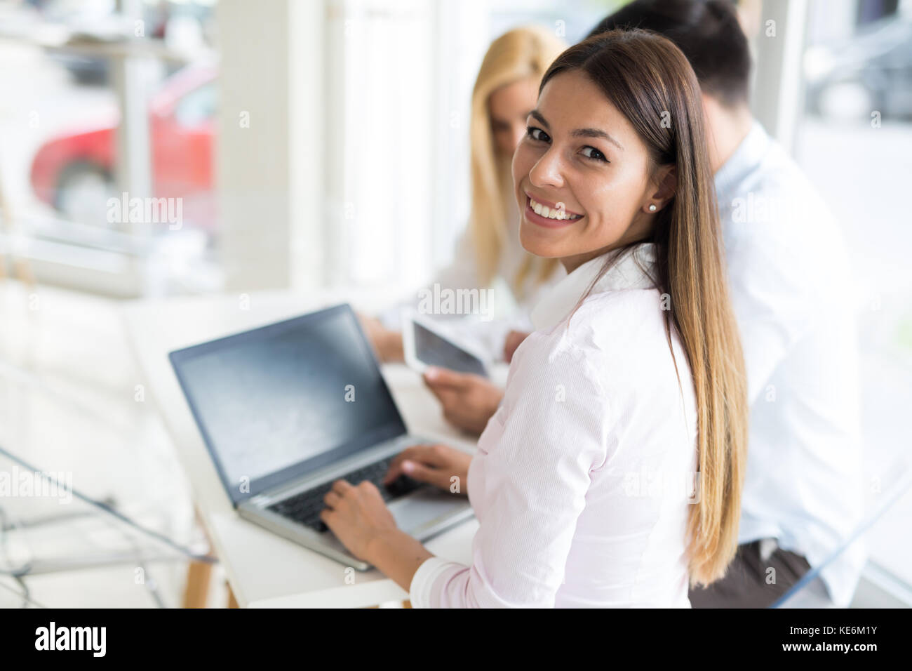 Young employee working on computer during working day in office Stock ...