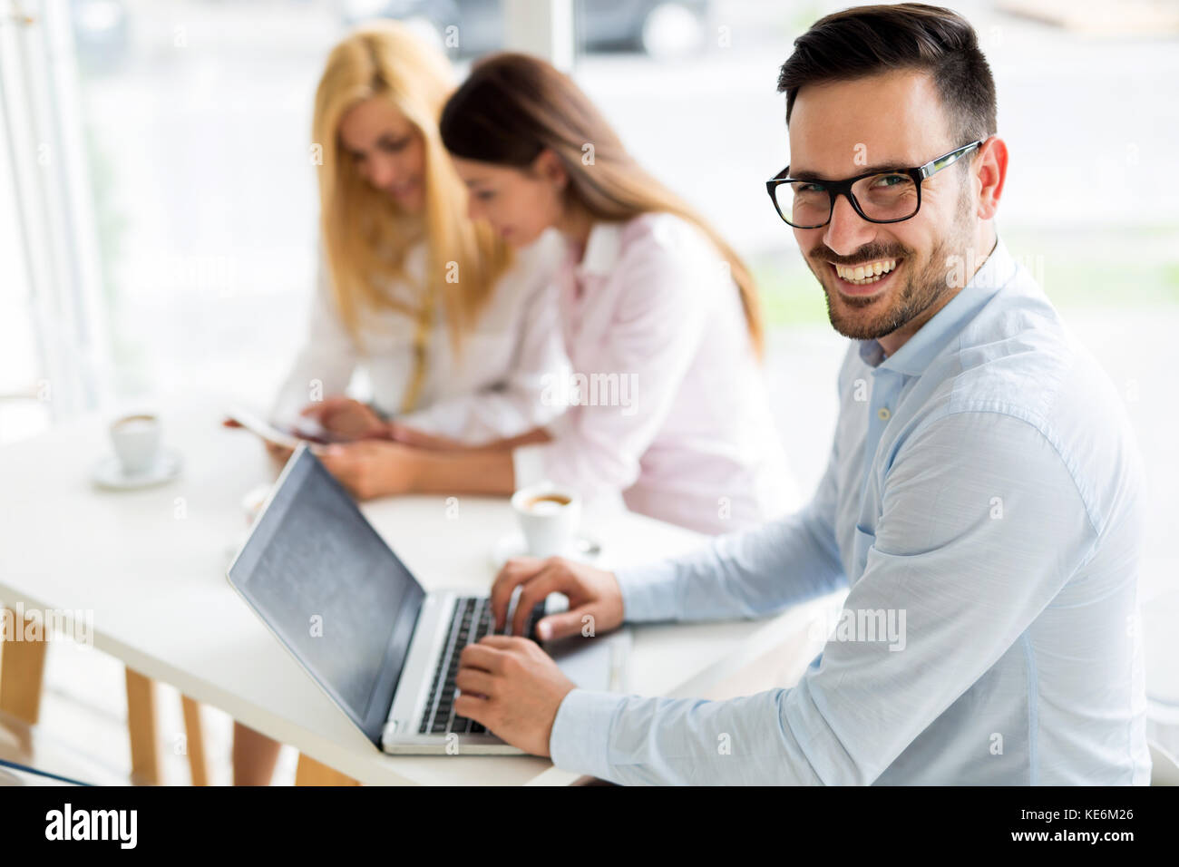 Young employee working on computer during working day in office Stock ...