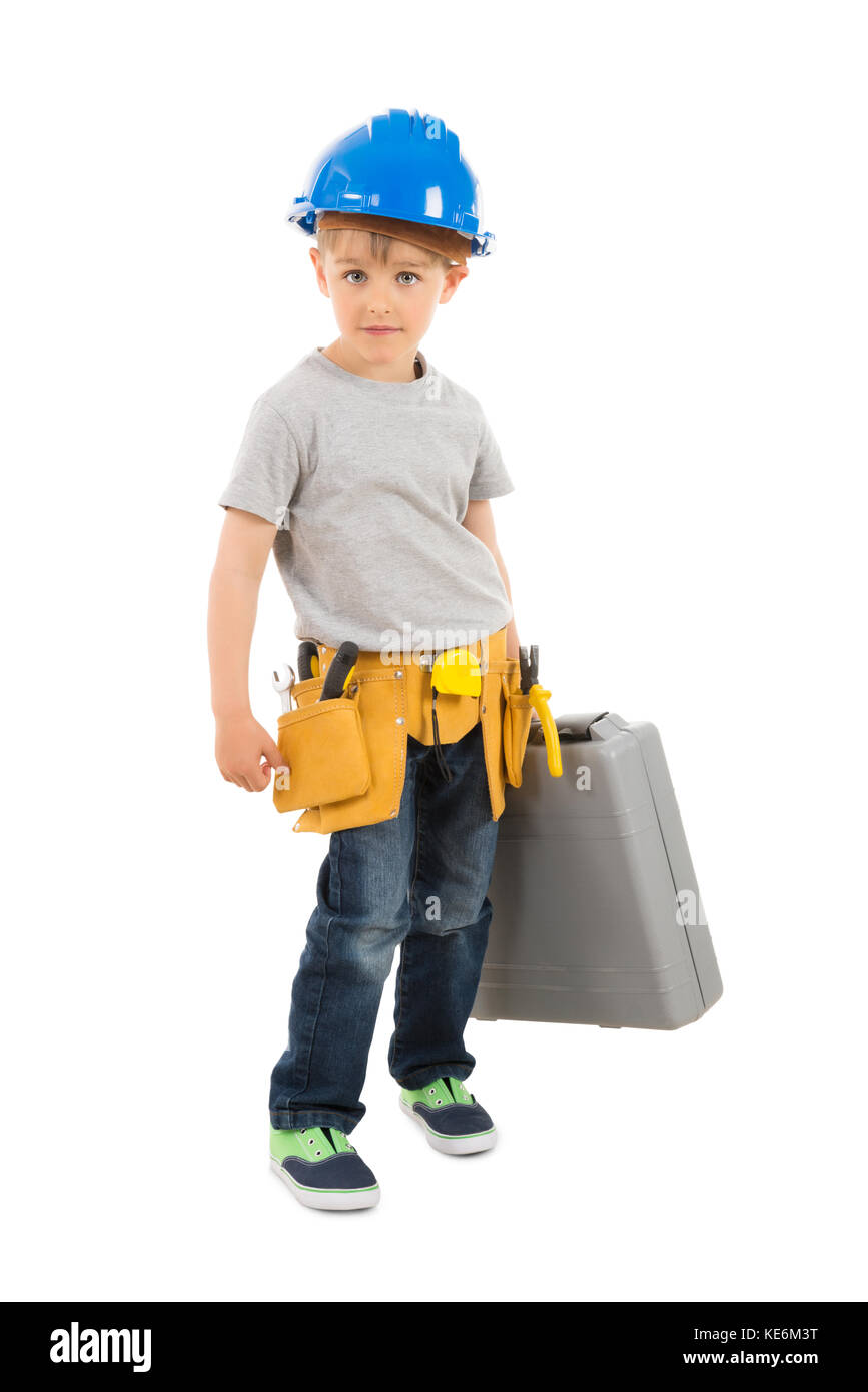 Portrait Of Boy Holding Toolbox Over White Background Stock Photo - Alamy