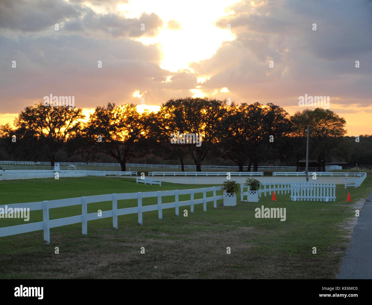Sunset over white corral fences hi-res stock photography and images - Alamy