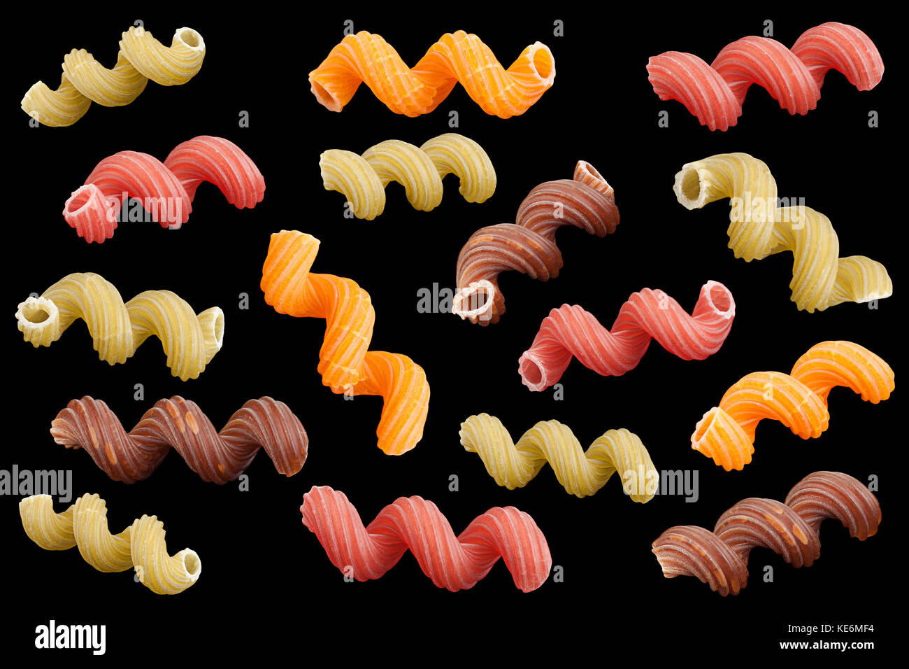 Multicolor swirl pasta collection isolated on black background Stock ...