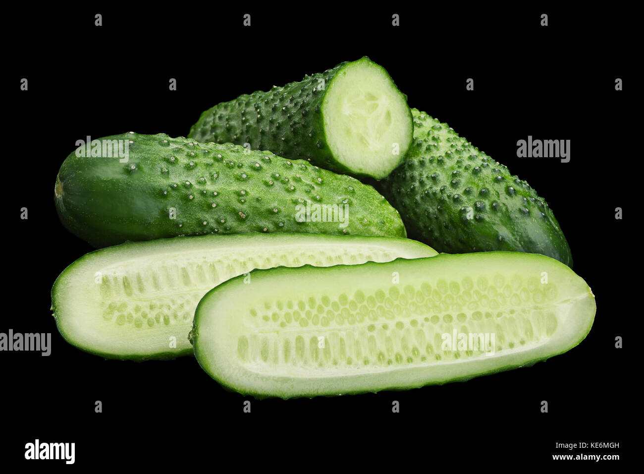 Cucumber vegetable isolated on black background Stock Photo - Alamy