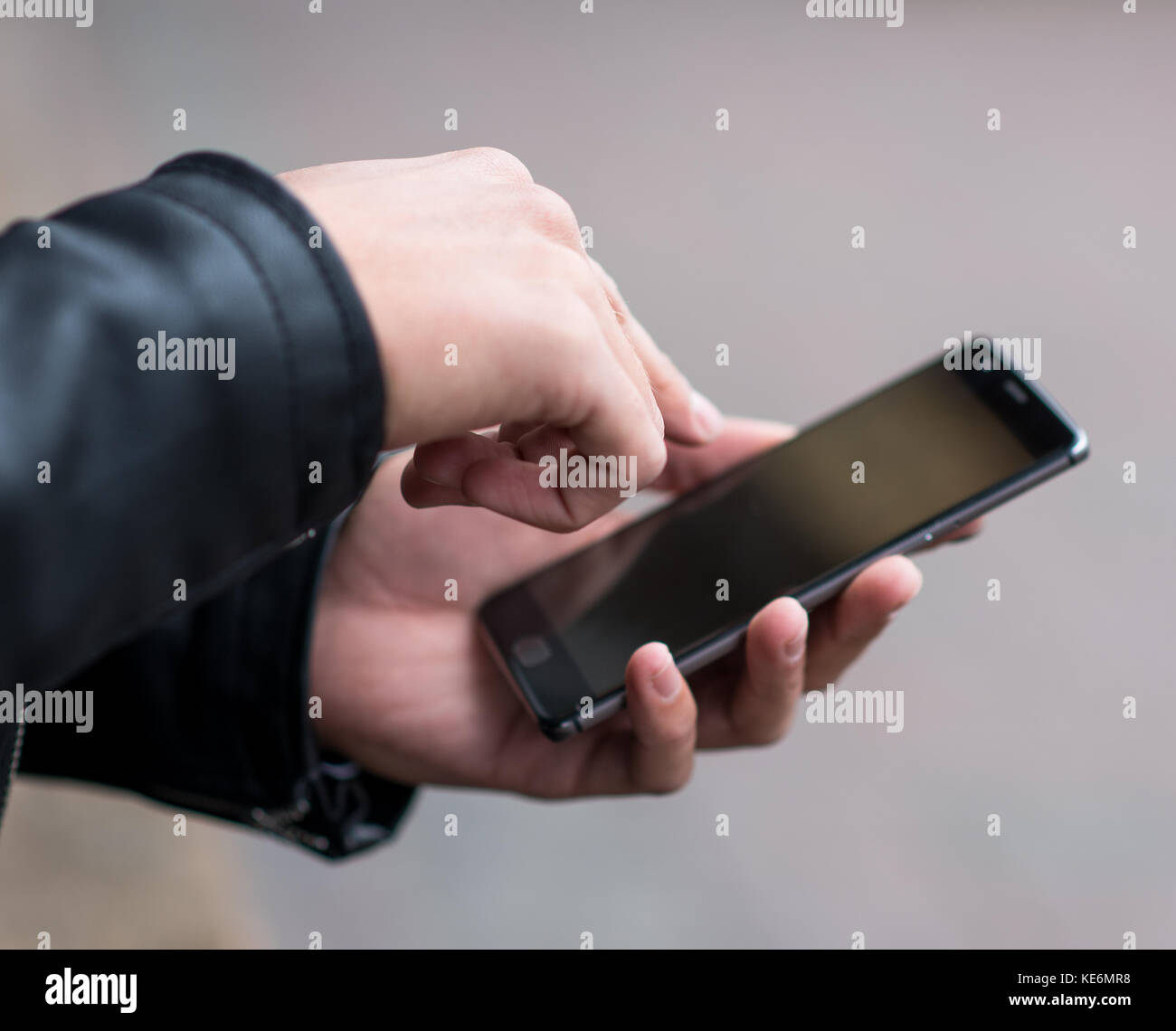 mobile phone in male Stock Photo - Alamy
