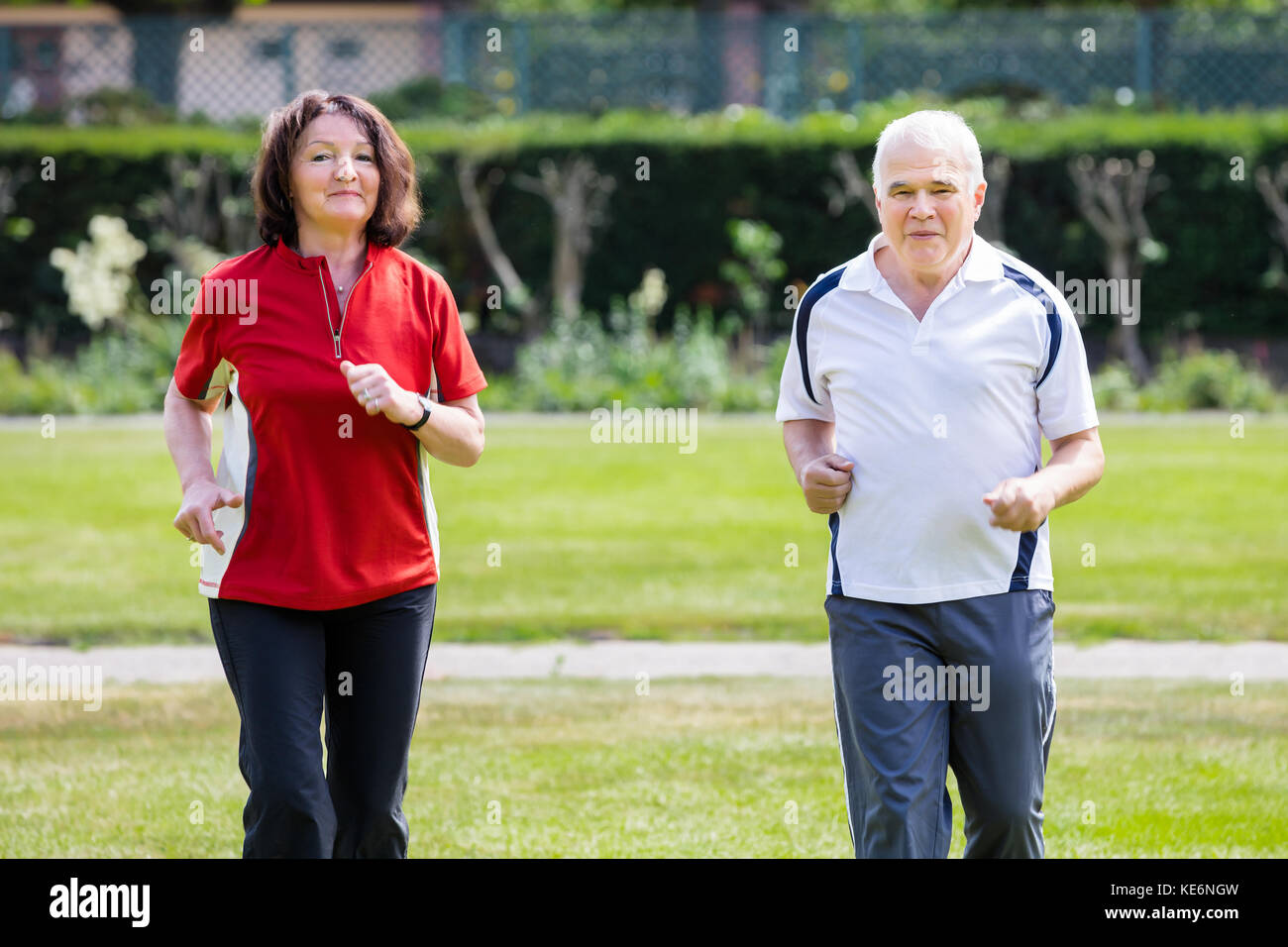 Old couple running hi-res stock photography and images - Alamy