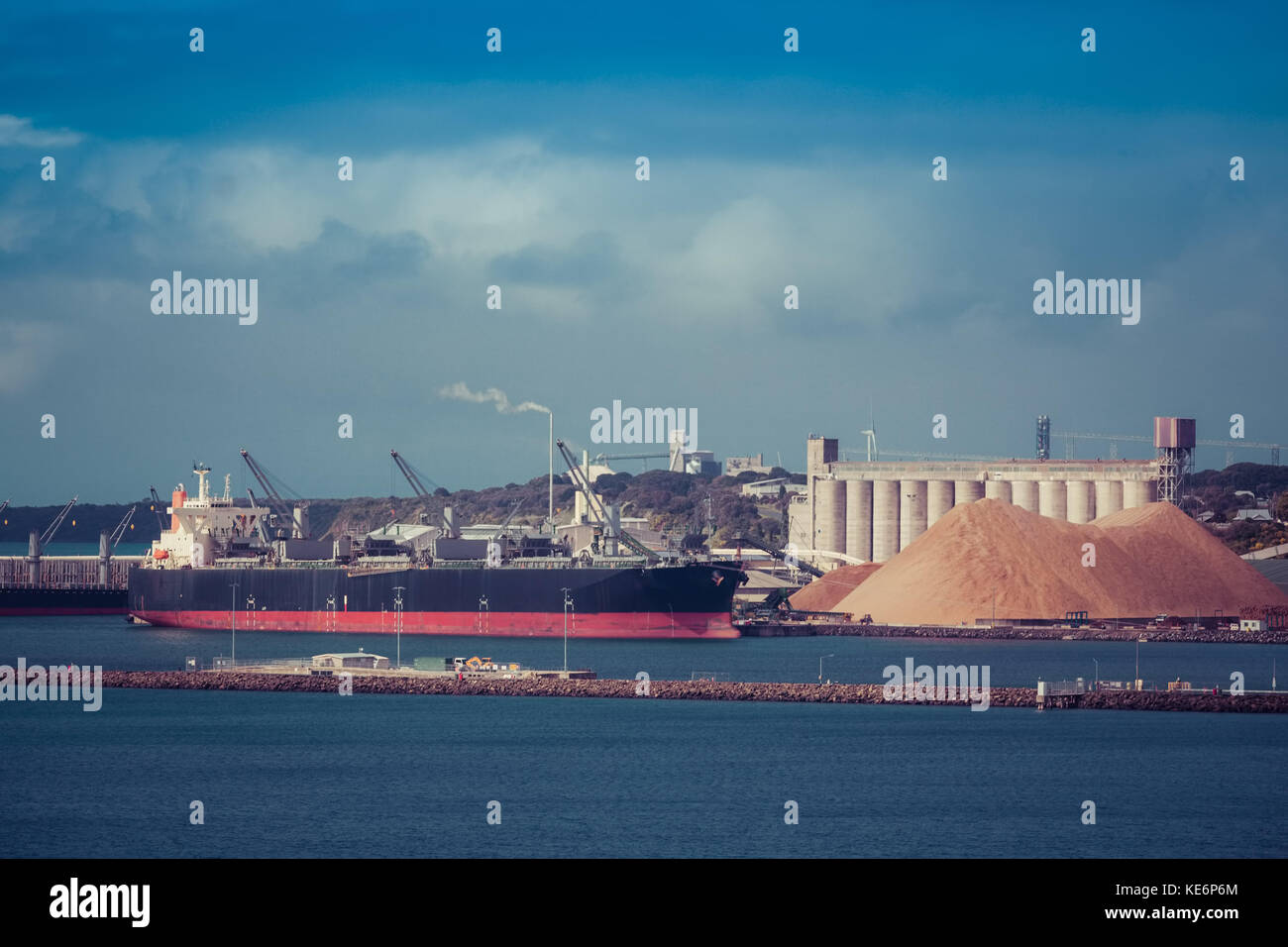 Industrial cargo ship in port in Australia Stock Photo - Alamy