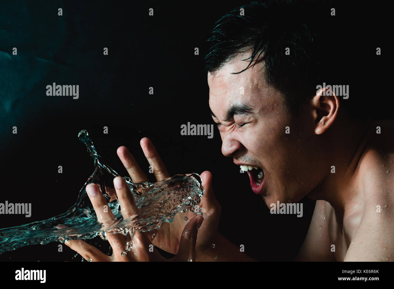 Face water splash hi-res stock photography and images - Alamy