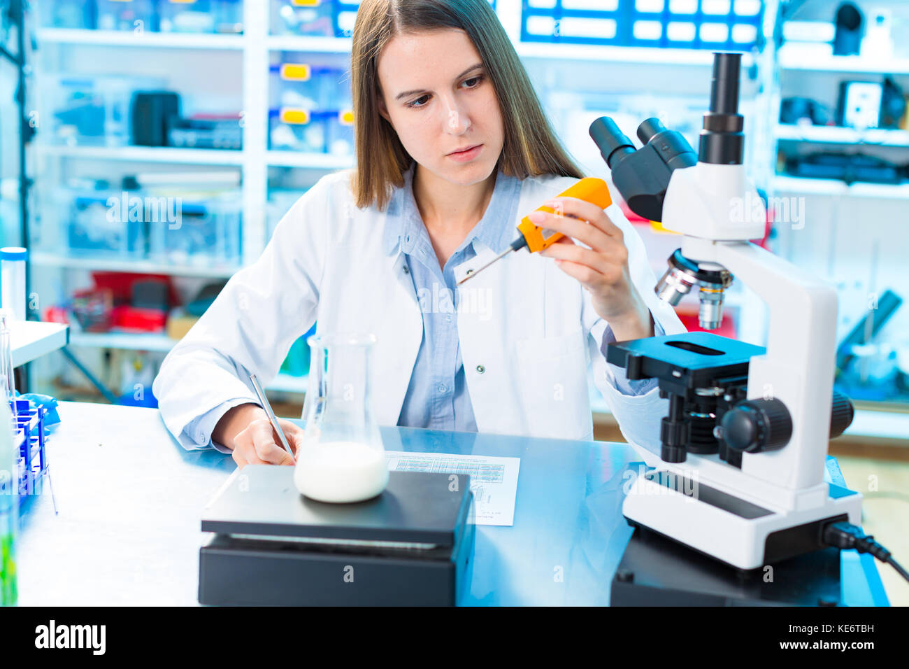 Quality control for processed foods. Dairy product research Stock Photo ...