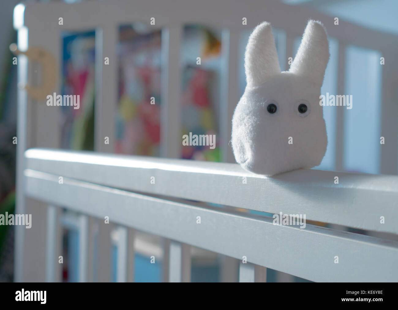 Plush toys on a cot Stock Photo - Alamy