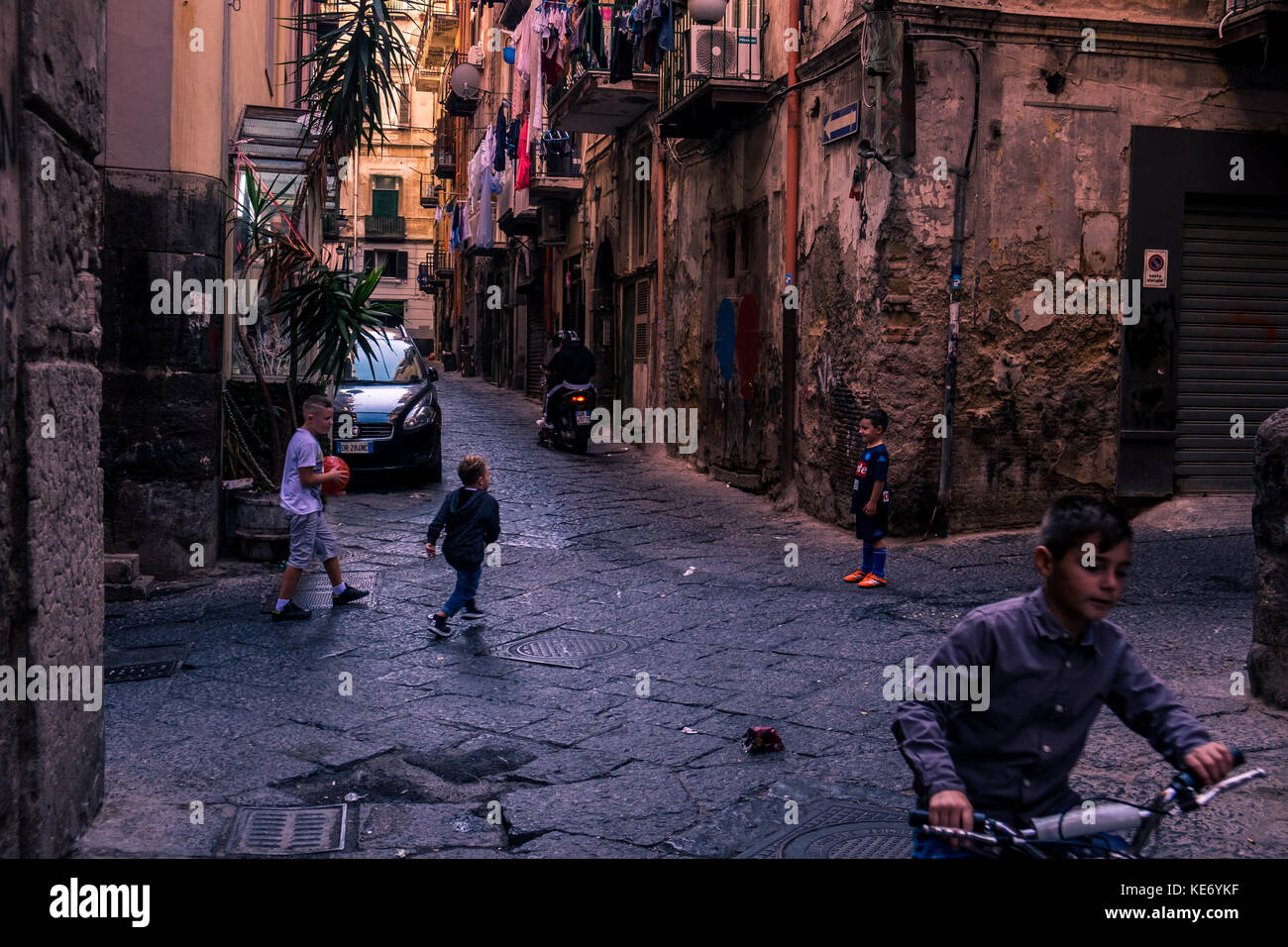 Children playing in Neapolitan street in Spanish Quarter Stock Photo ...