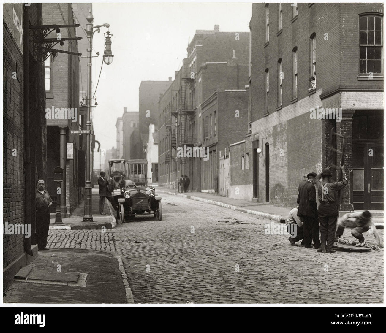 Street scene showing an unidentified street at the corner of 2nd Street ...