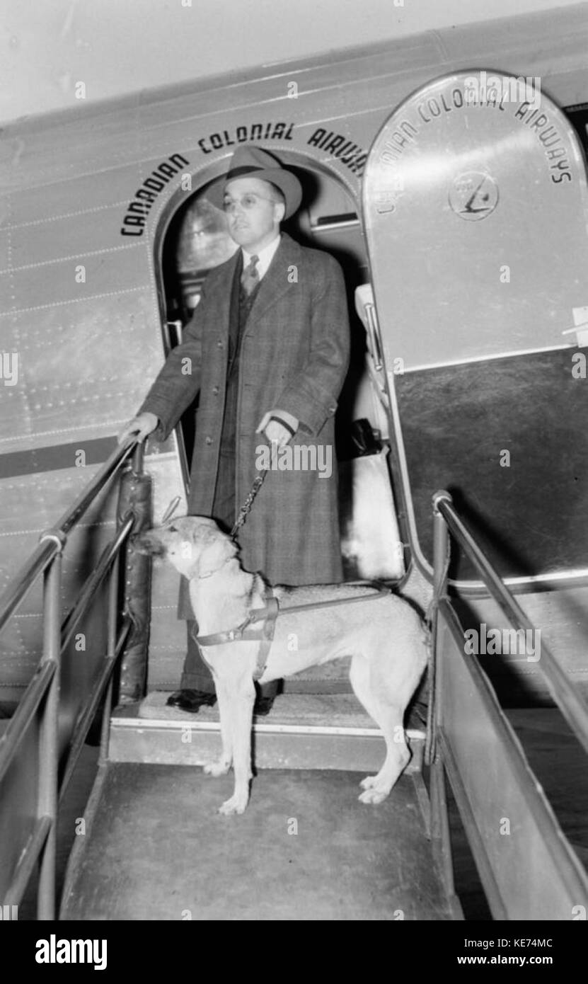 Animal. Mr Thomas & his Seeing Eye Dog BAnQ P48S1P06211 Stock Photo - Alamy