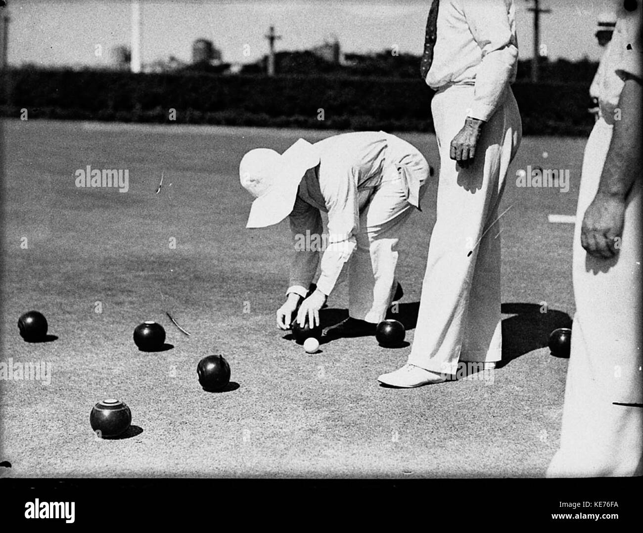 This image shows a participant at Country Bowls Week, wearing a floppy ...