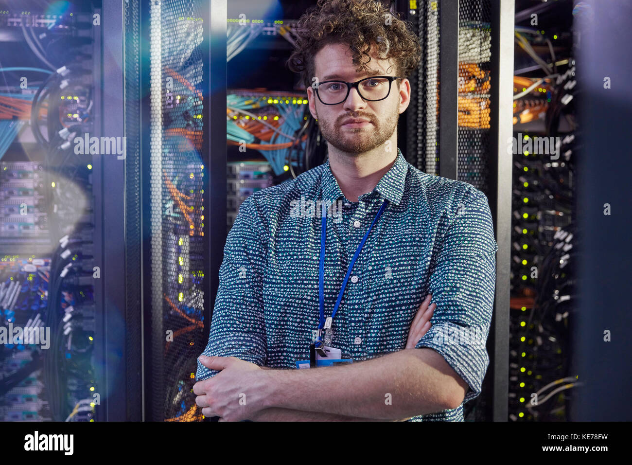 Portrait confident male IT technician in server room Stock Photo - Alamy
