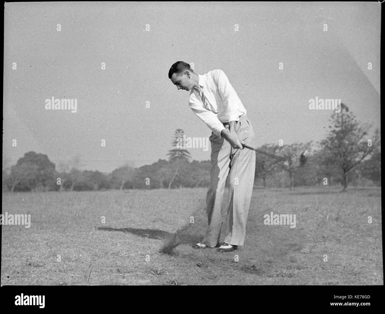 Dan Cullen, a professional golfer, is demonstrating golf techniques at ...