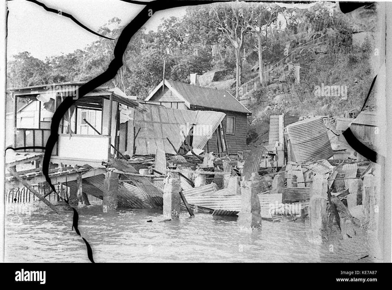 442601 Houses built over the water destroyed Stock Photo - Alamy