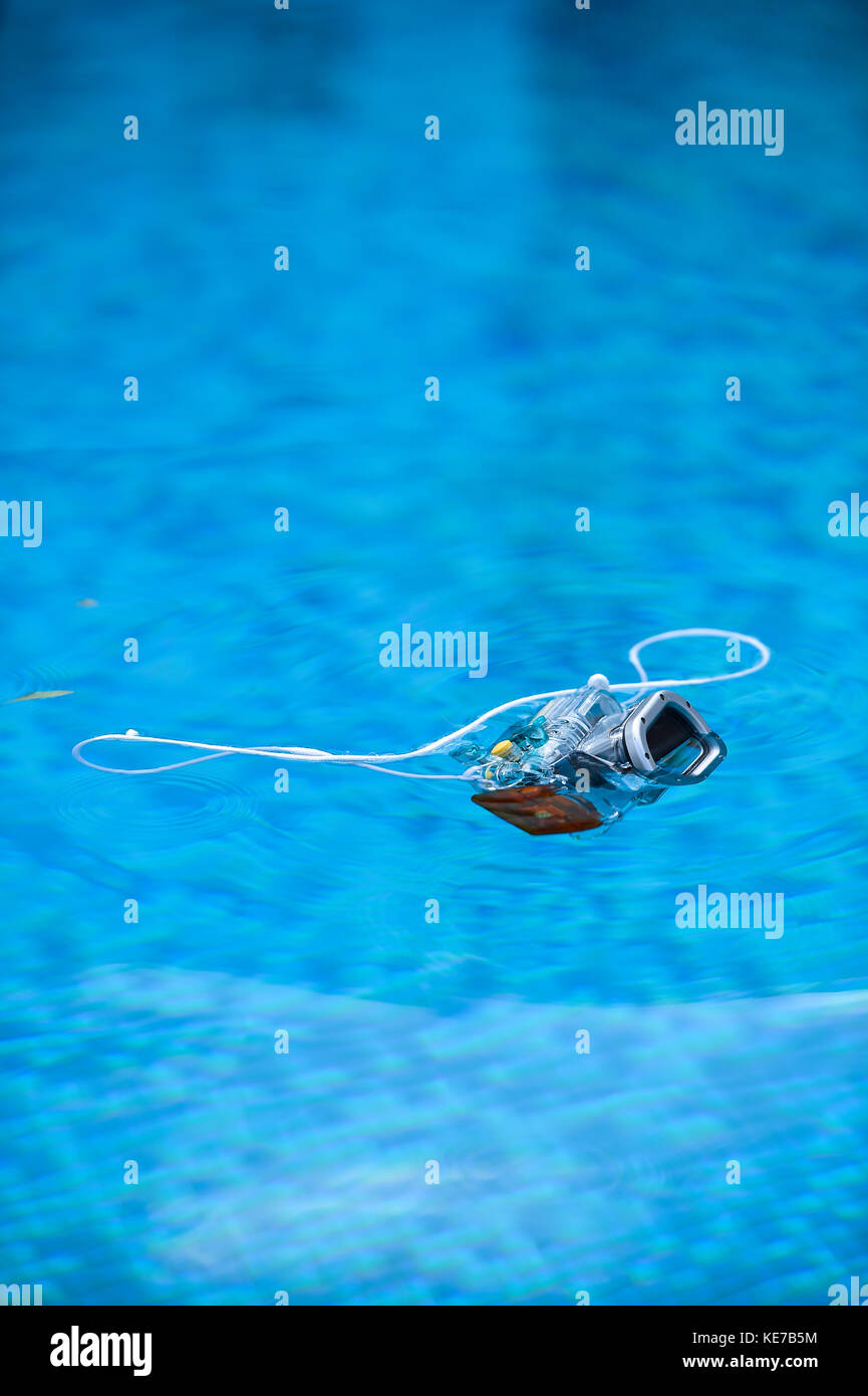 Underwater photo camera housing floating in a swimming pool Stock Photo ...