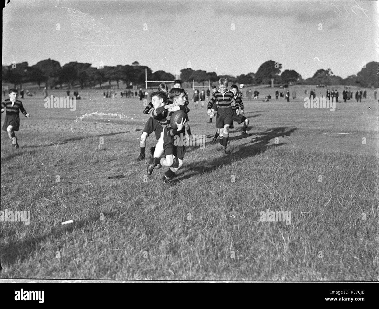 Children playing football school Black and White Stock Photos & Images ...