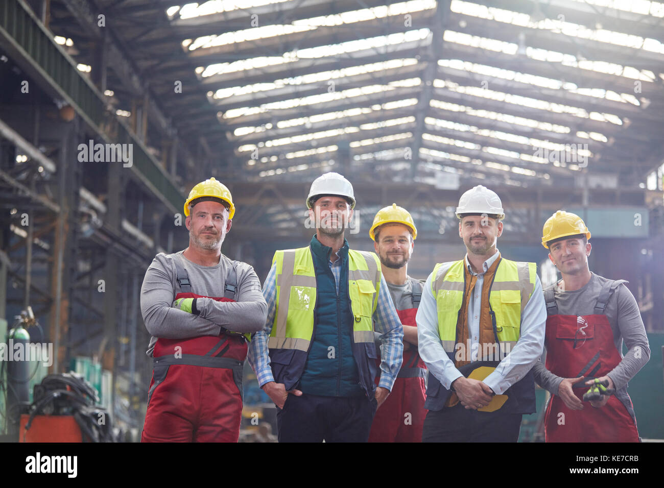 Portrait confident engineers and workers in factory Stock Photo - Alamy