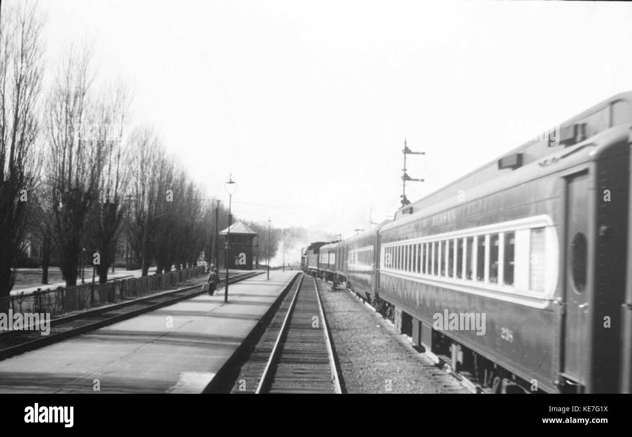 A historical photograph capturing a railway scene at Montreal West ...