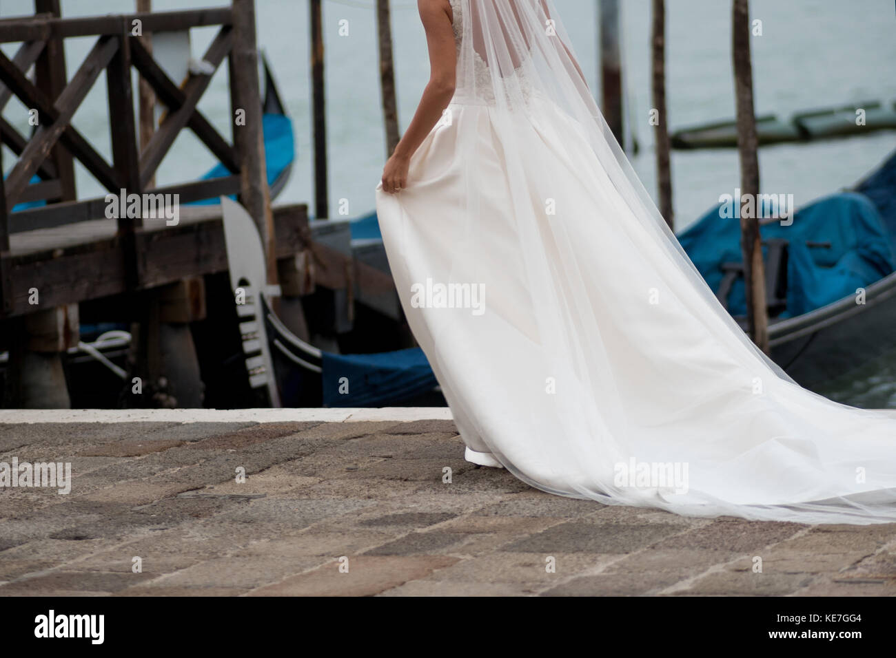 Beautiful wedding in Venice, bride back view Stock Photo - Alamy