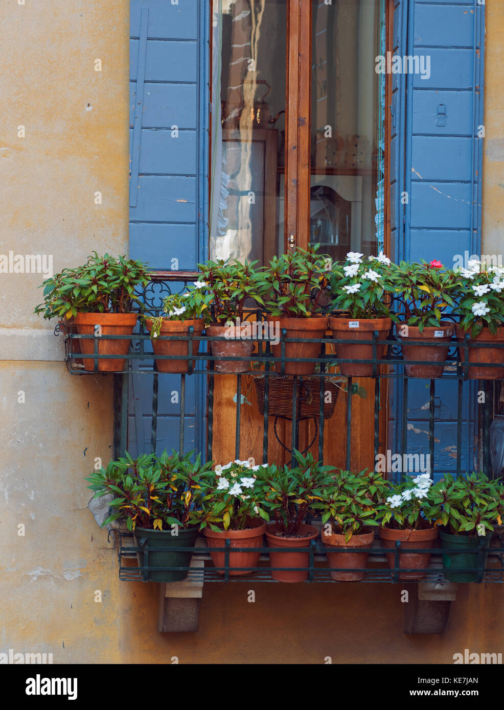 Italian window with wooden shutters Stock Photo - Alamy
