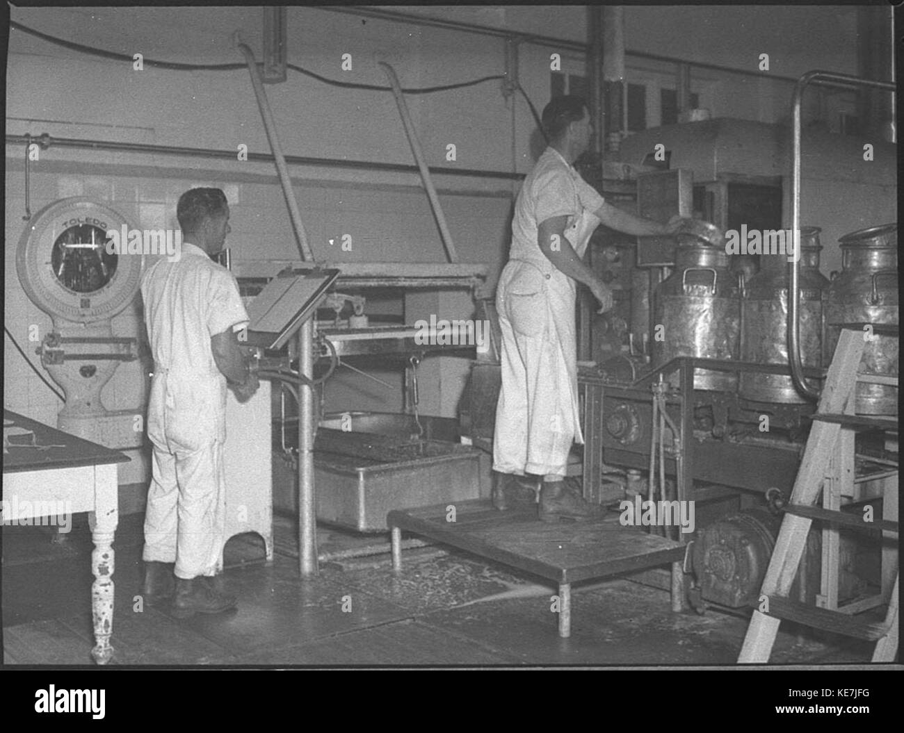 Food processing equipment operation Black and White Stock Photos ...