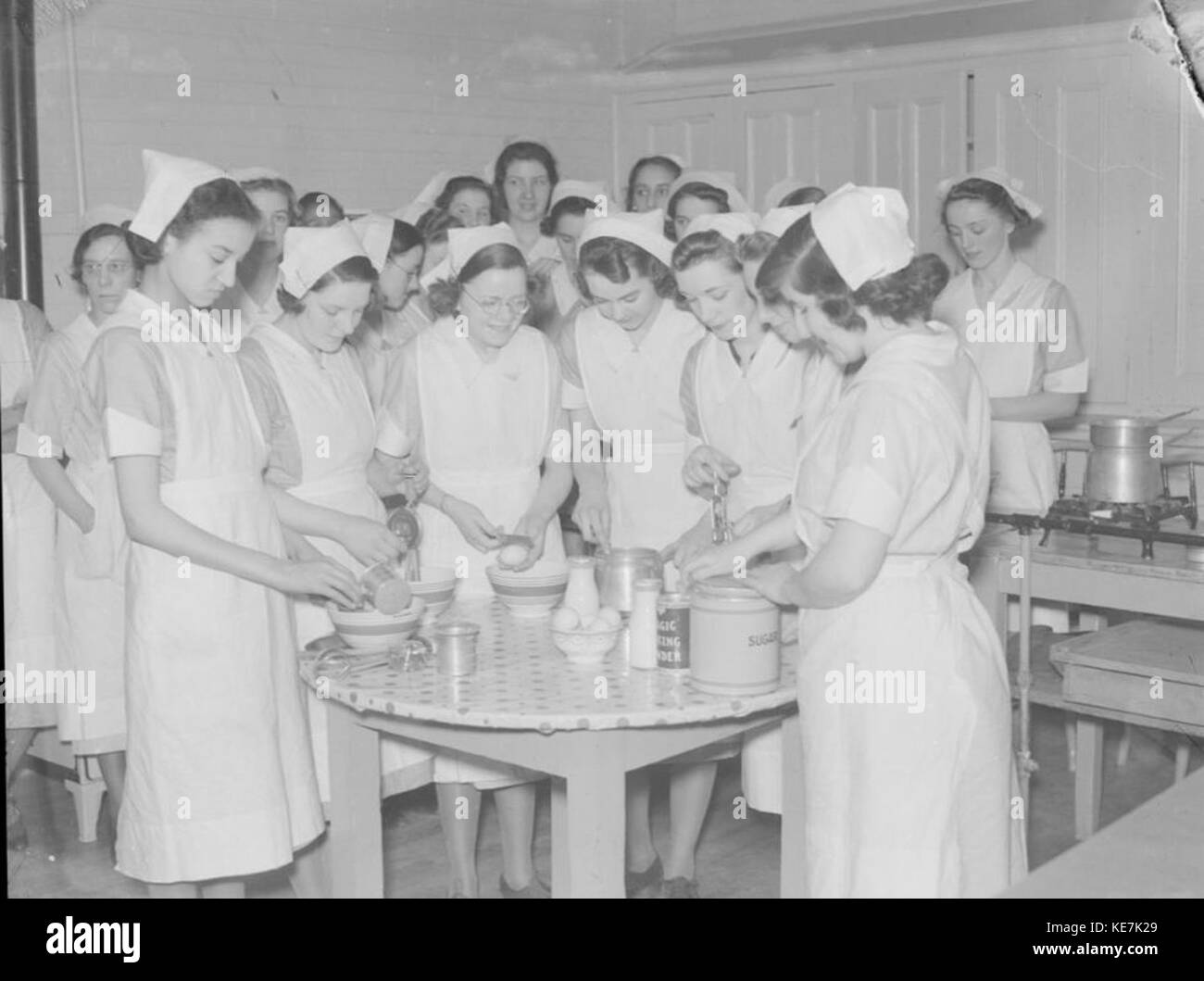 This image illustrates a course on Domestic Science held at the Y.W.C.A ...