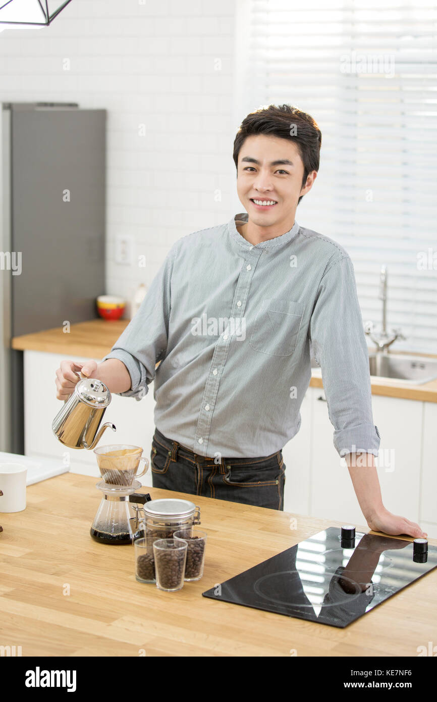 Man making coffee hi-res stock photography and images - Alamy