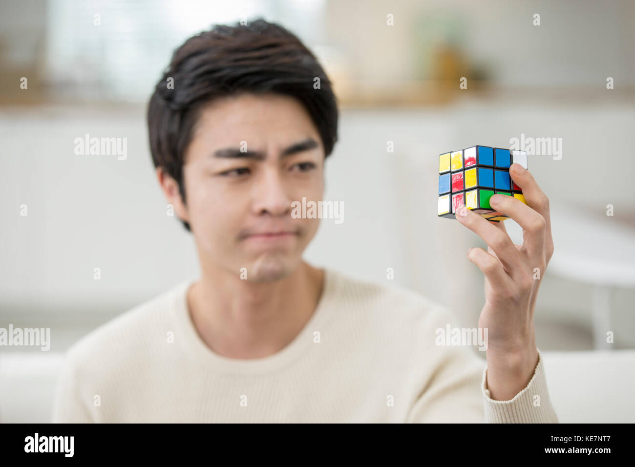 Person holding puzzle cube hi-res stock photography and images - Alamy