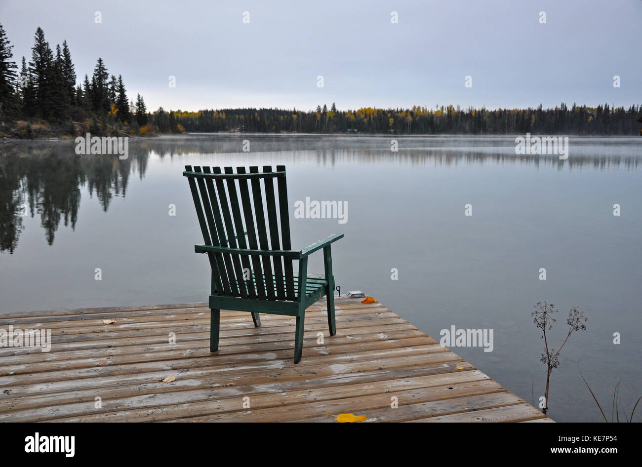 Empty wooden chair hi-res stock photography and images - Alamy