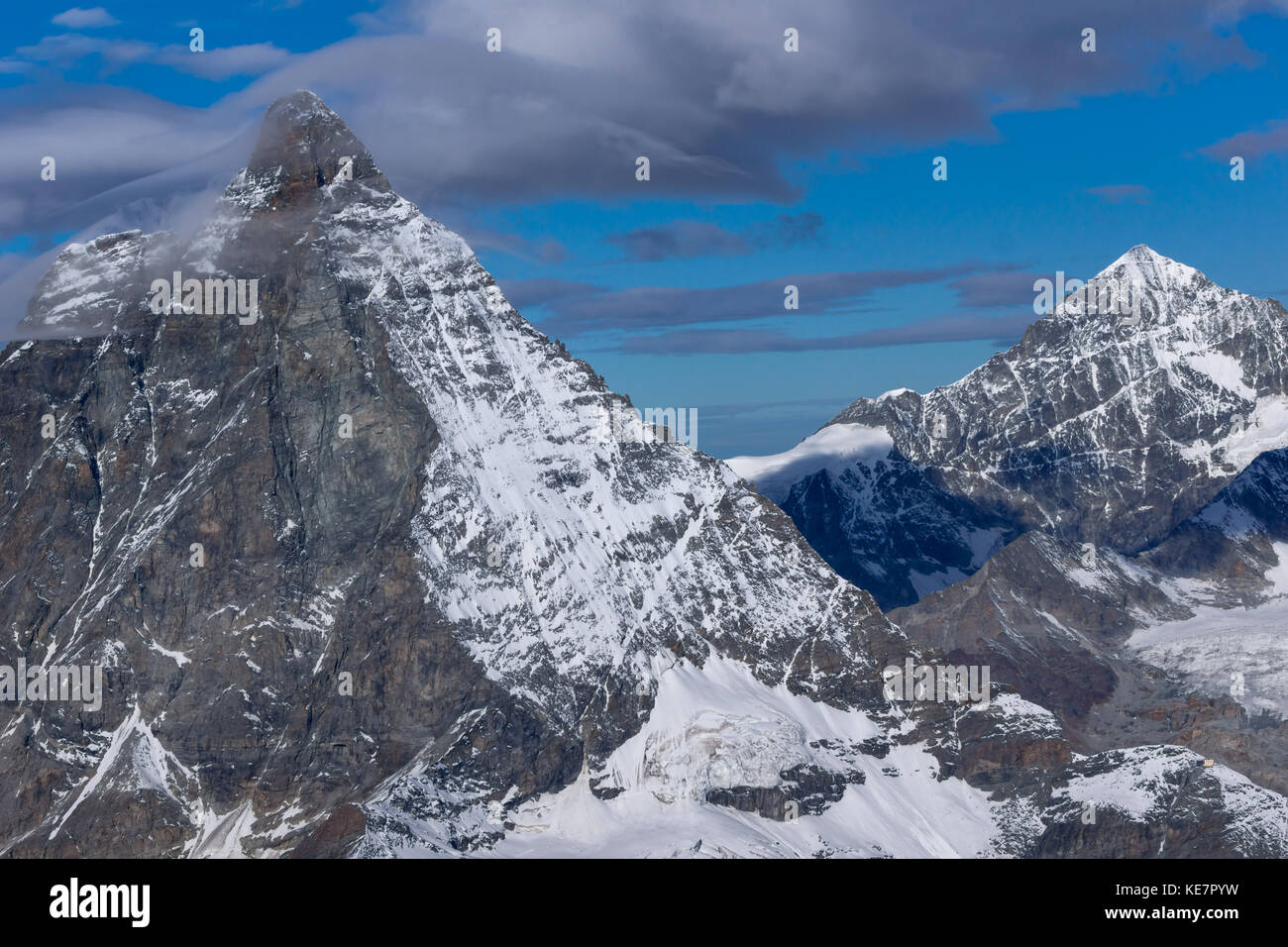 Winter panorama of mount Matterhorn covered with clouds, Canton of ...