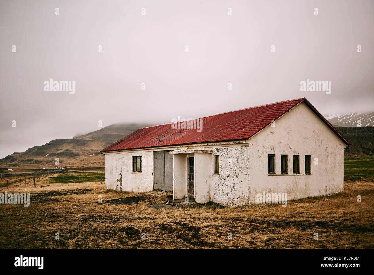 Weathered Building Under Clouds On The Snaefellsnes Peninsula; Iceland ...