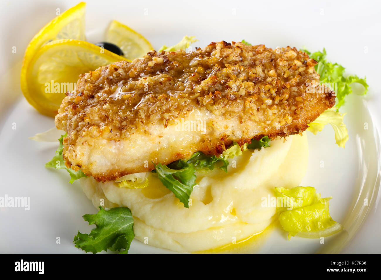 Baked Cod fish with mashed potato Stock Photo - Alamy
