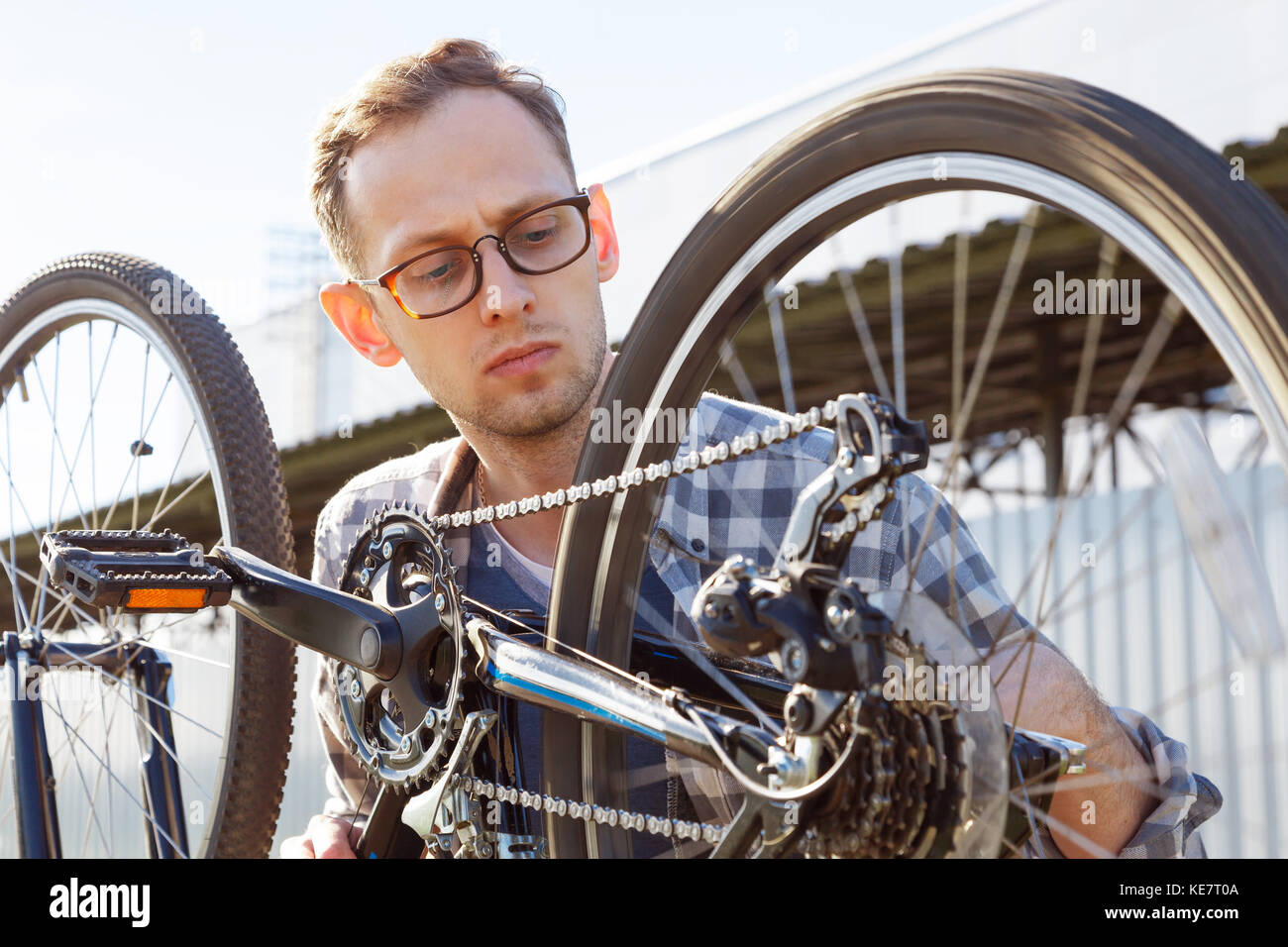 Mechanic man checks transmission hi-res stock photography and images ...
