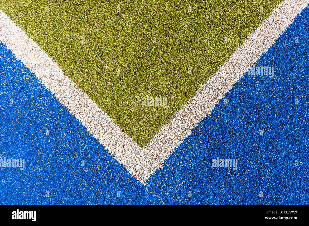 Sports astro synthetic turf field closeup corner boundary white line ...