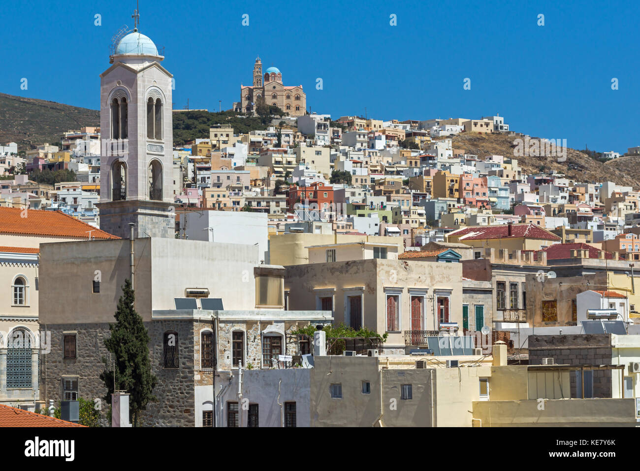 Panoramic view with belfry of Churches in town of Ermopoli, Syros ...