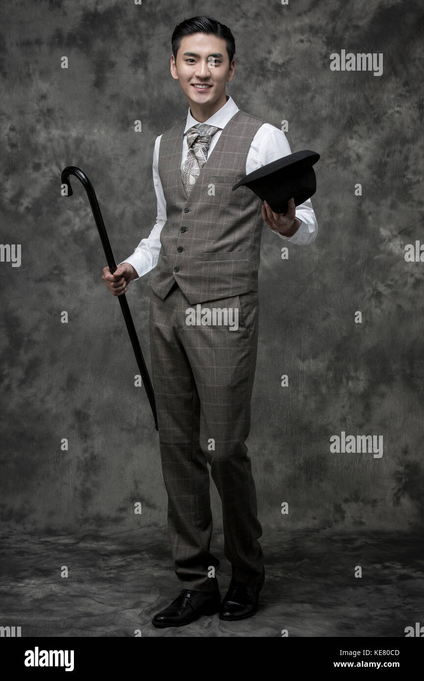 Cane man hat suit hi-res stock photography and images - Alamy