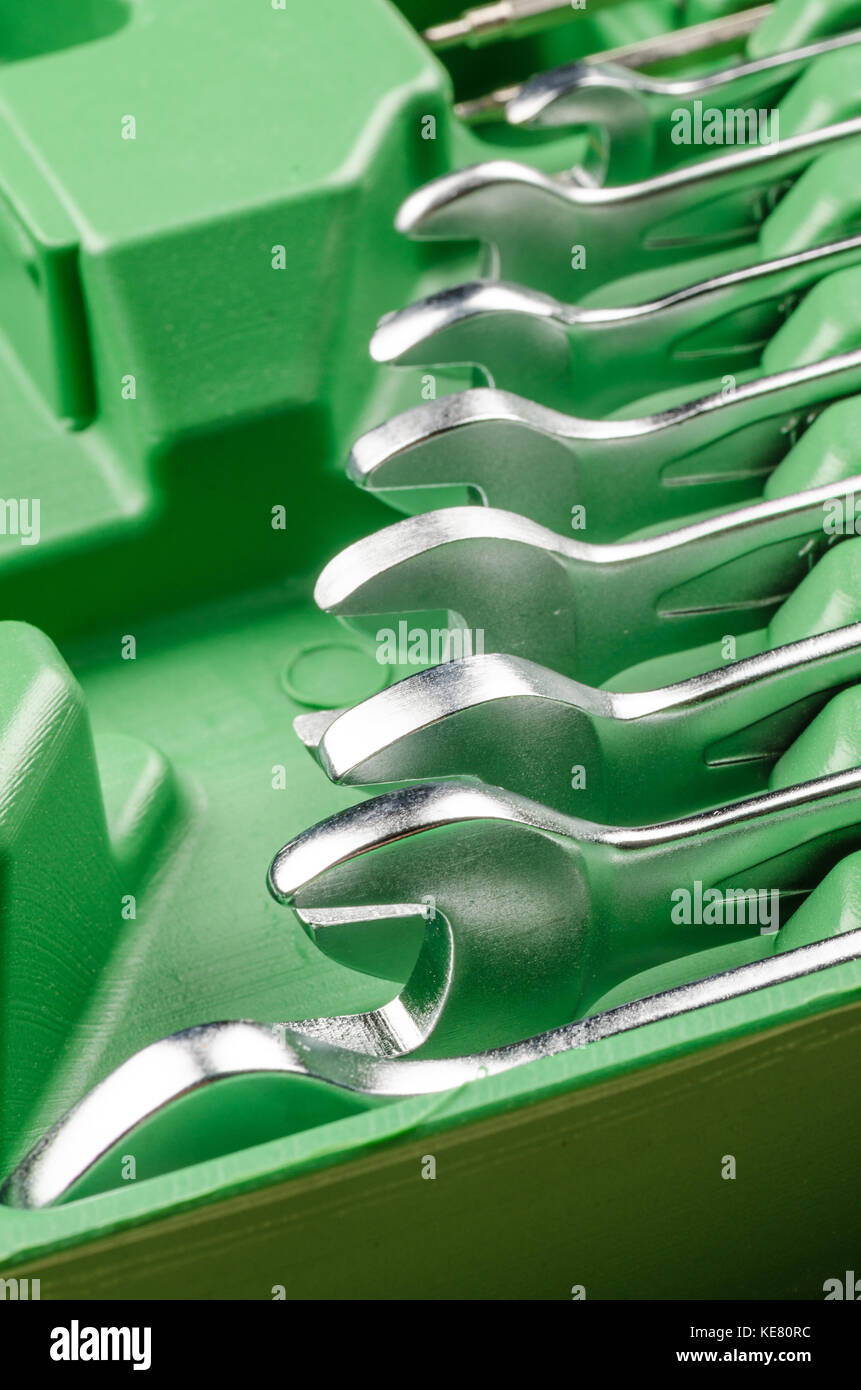 Wrenches assorted by size inside a tool box Stock Photo - Alamy