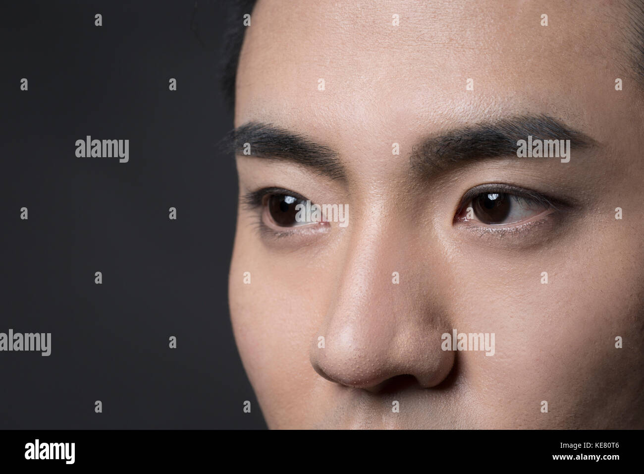 Asian male face close up hi-res stock photography and images - Alamy