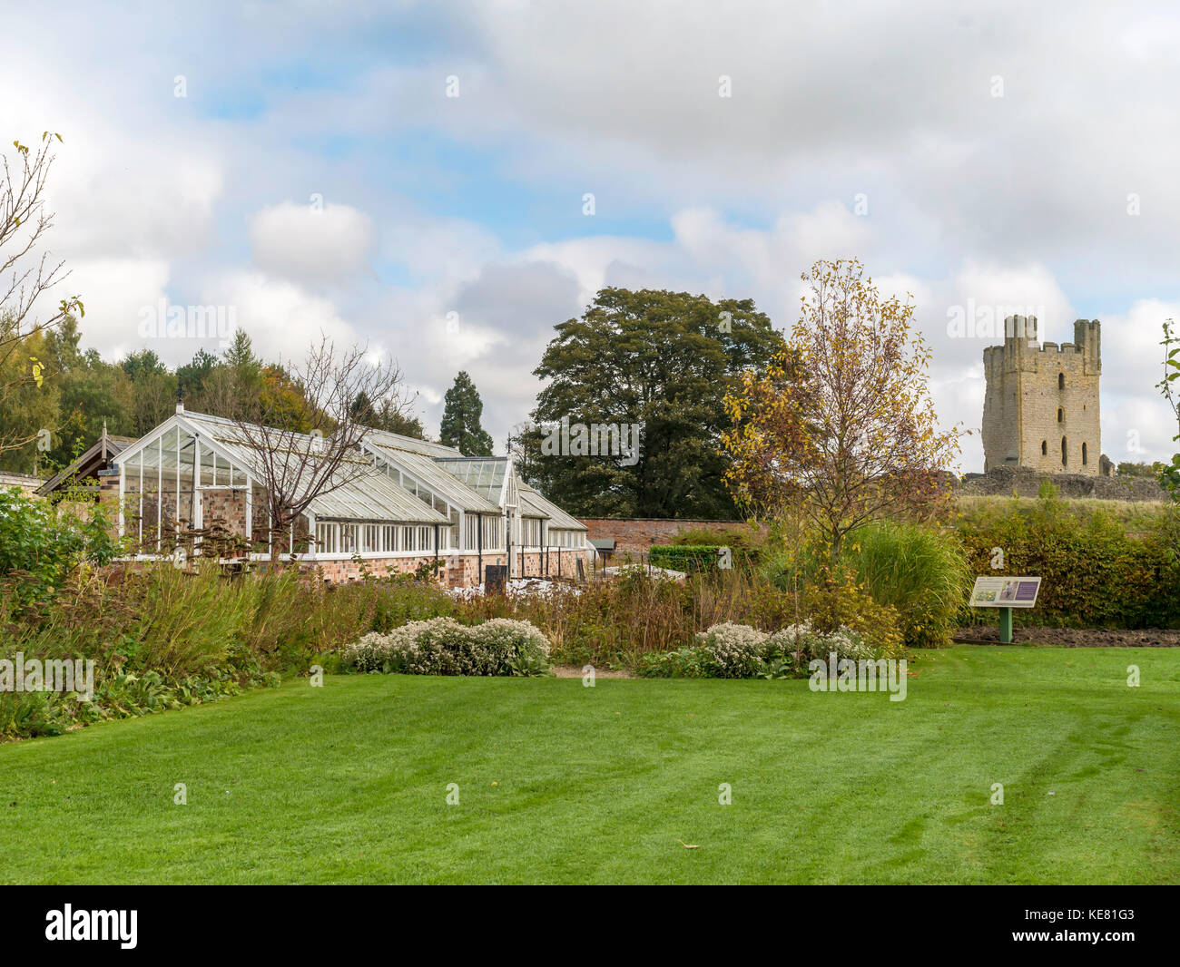 Helmsley Castle overlooking the Helmsley Walled Garden with a show of ...